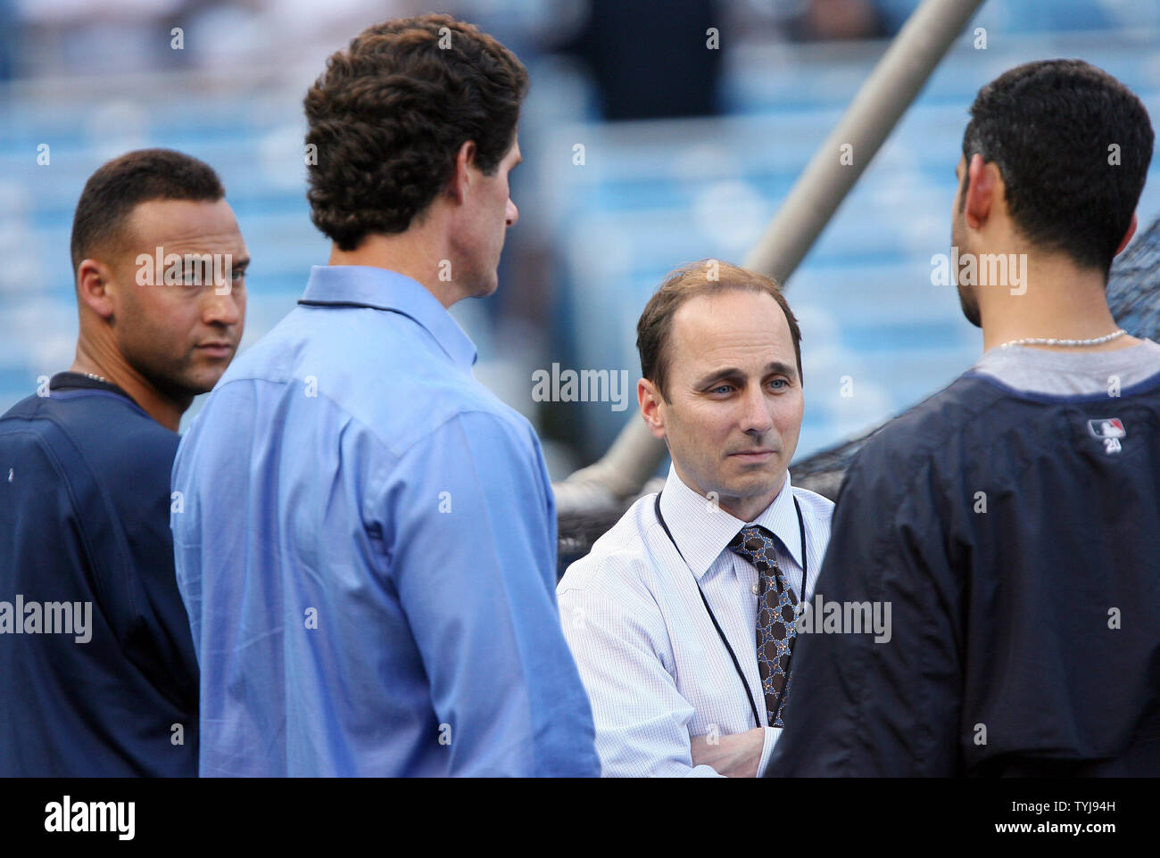 New York Yankees general manager Brian Cashman stands with his arms ...