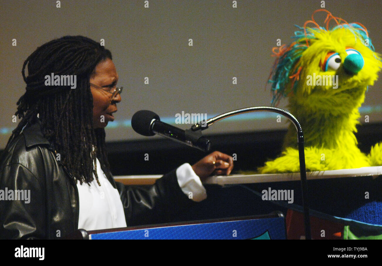 Actress Whoopi Goldberg chats with the new muppet Azibo during a news ...