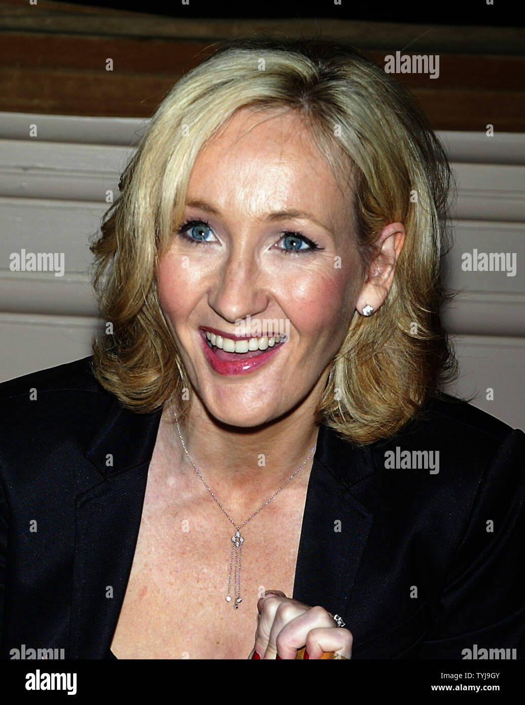 J.K. Rowling signs copies of her book "Harry Potter and the Deathly ...