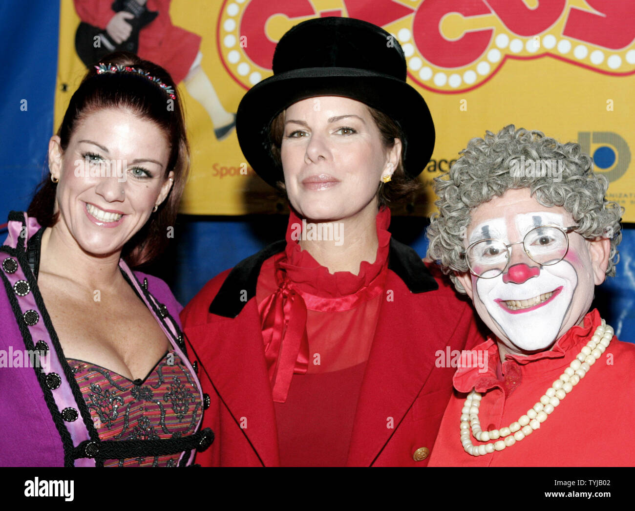 Actress Marcia Gay Harden (C) is joined by ringmaster Carrie Harvey (L ...