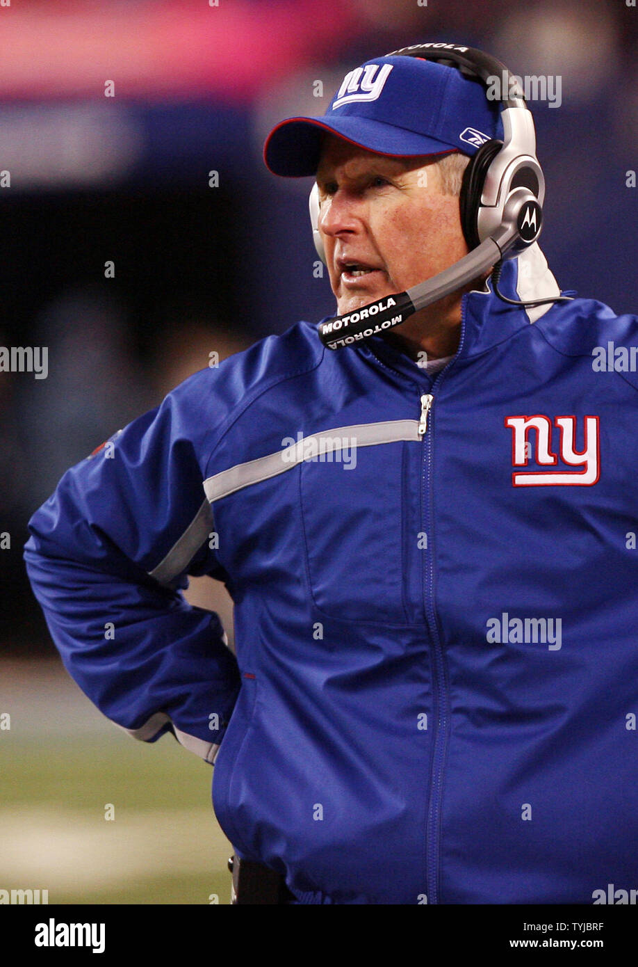 New York Giants head coach Tom Coughlin stands on the sidelines against ...