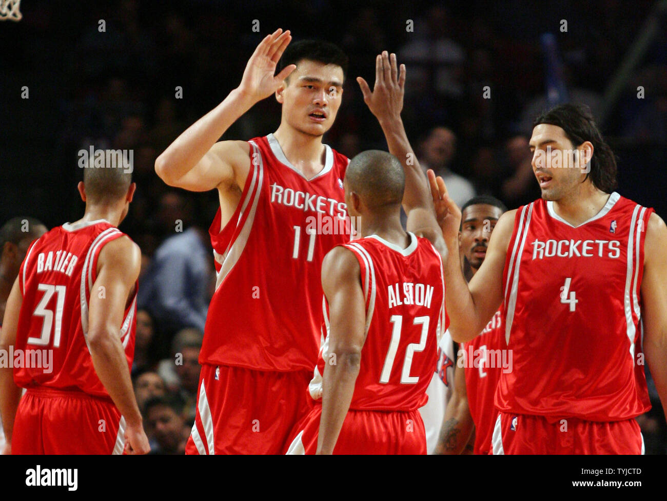 Houston Rockets Shane Battier (31), Yao Ming (11), and Rafer Alston (12 ...