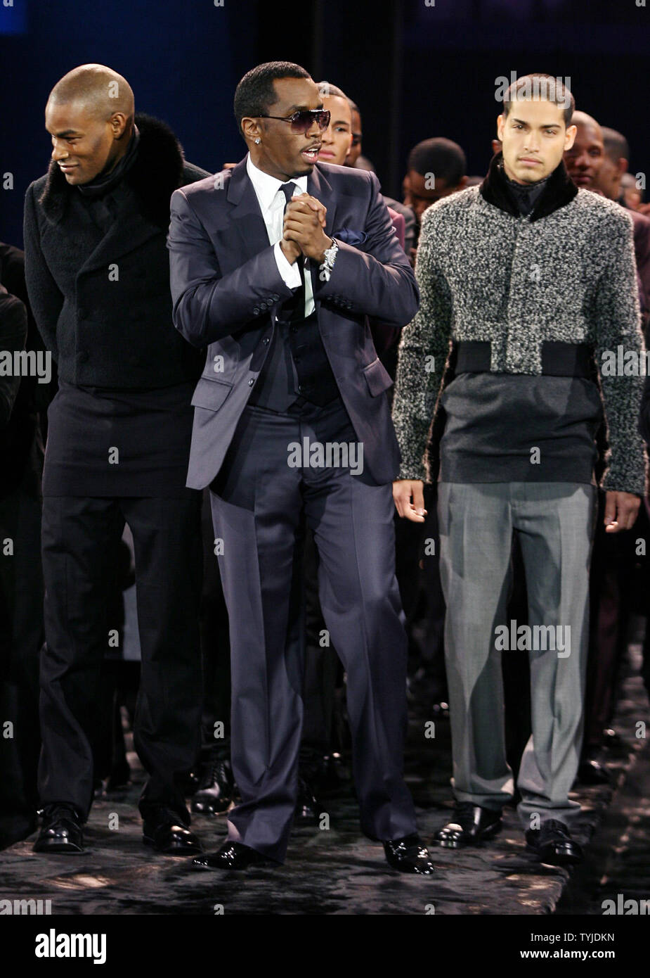 Sean Combs (C) walks out on the runway after the Sean John fashion show ...