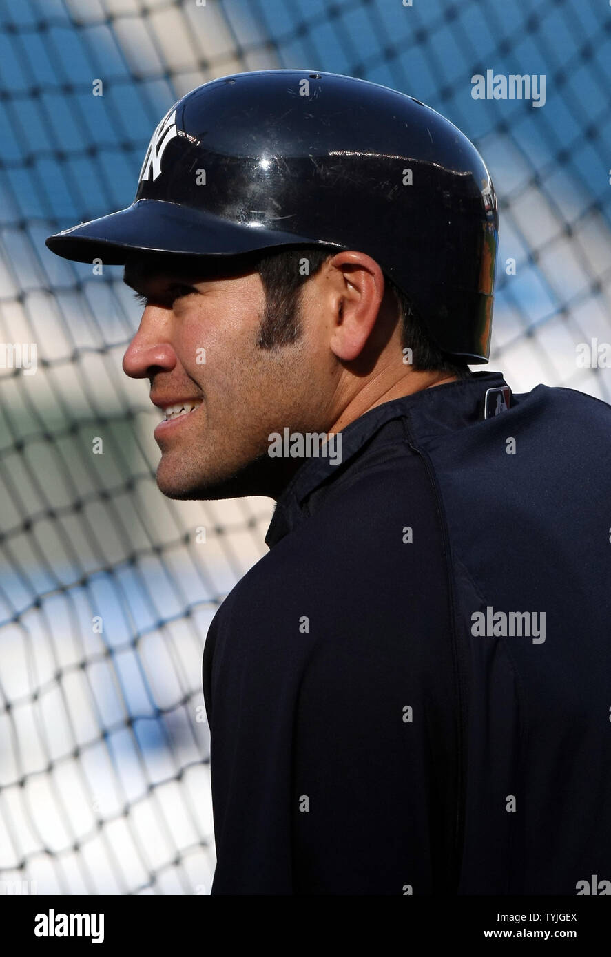 New York Yankees Johnny Damon smiles during batting practice before a ...
