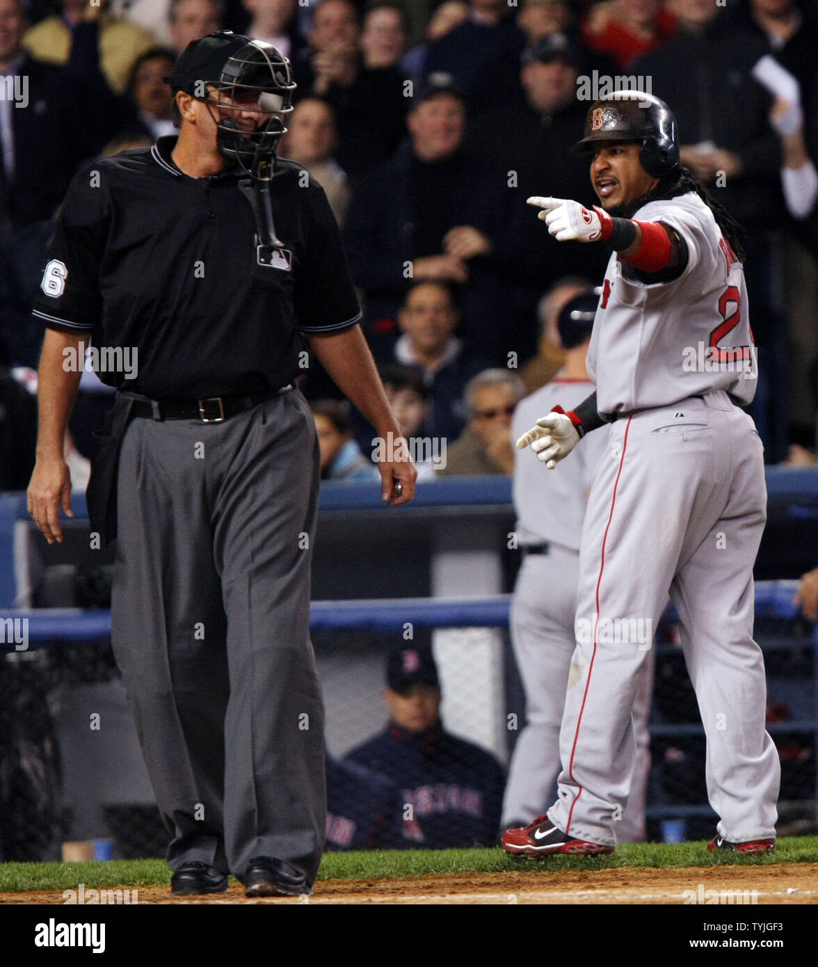 Boston Red Sox Manny Ramirez argues with home plate umpire Tim ...