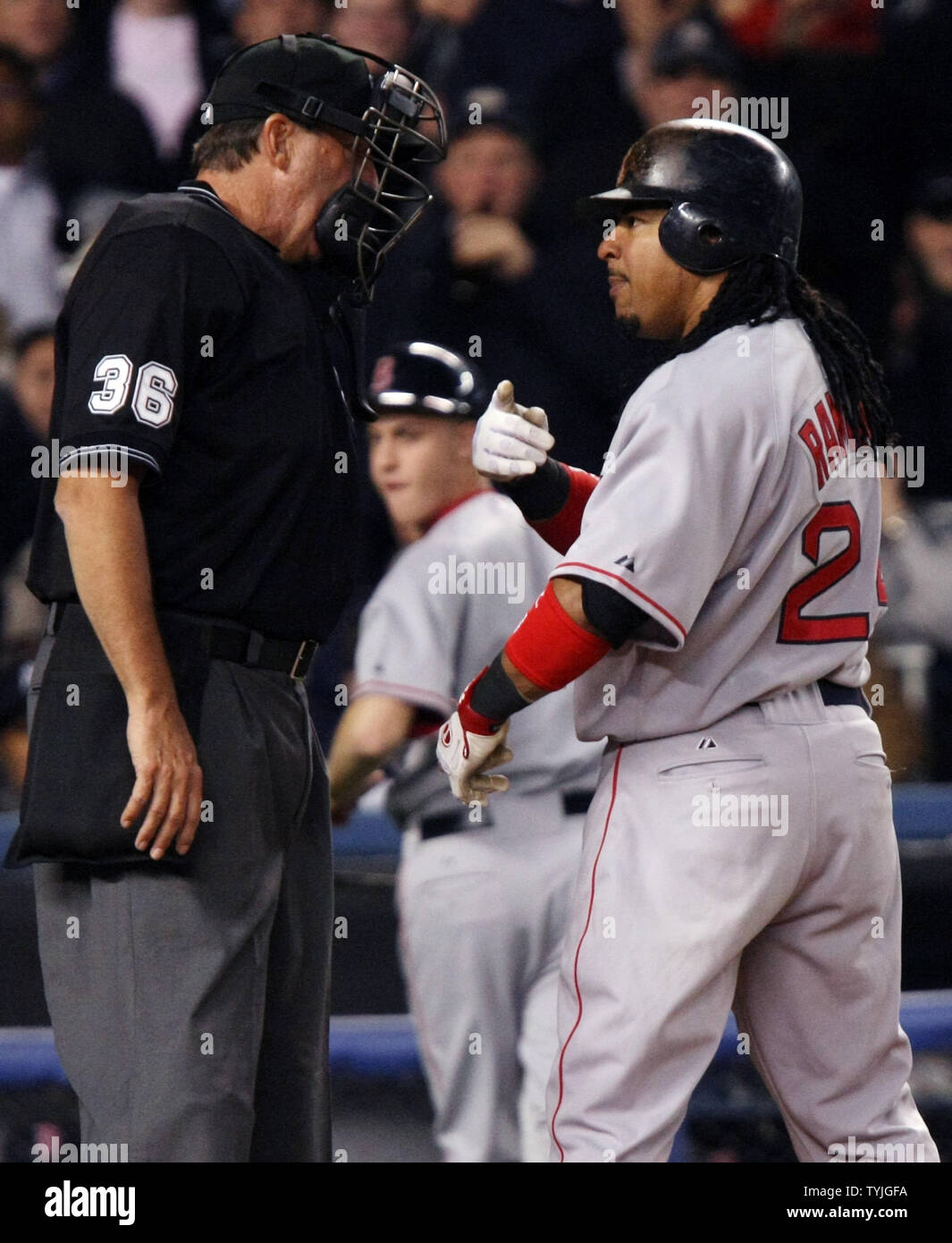 Boston Red Sox Manny Ramirez argues with home plate umpire Tim ...
