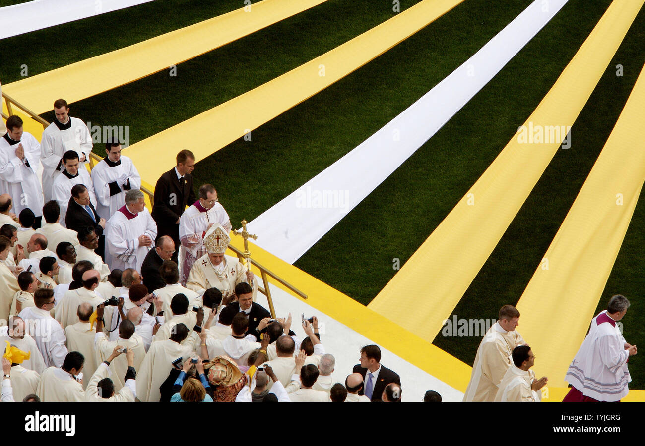Pope Benedict XVI holds the papel staff as he greets clergymen after ...