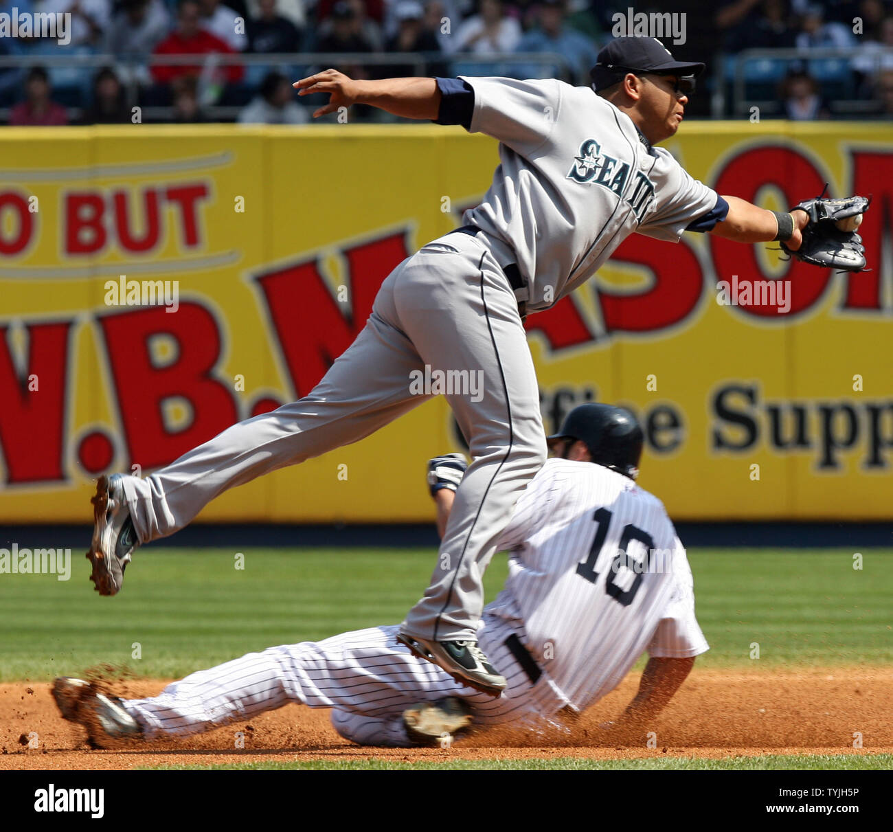 Photo of leaping second base hi-res stock photography and images - Alamy