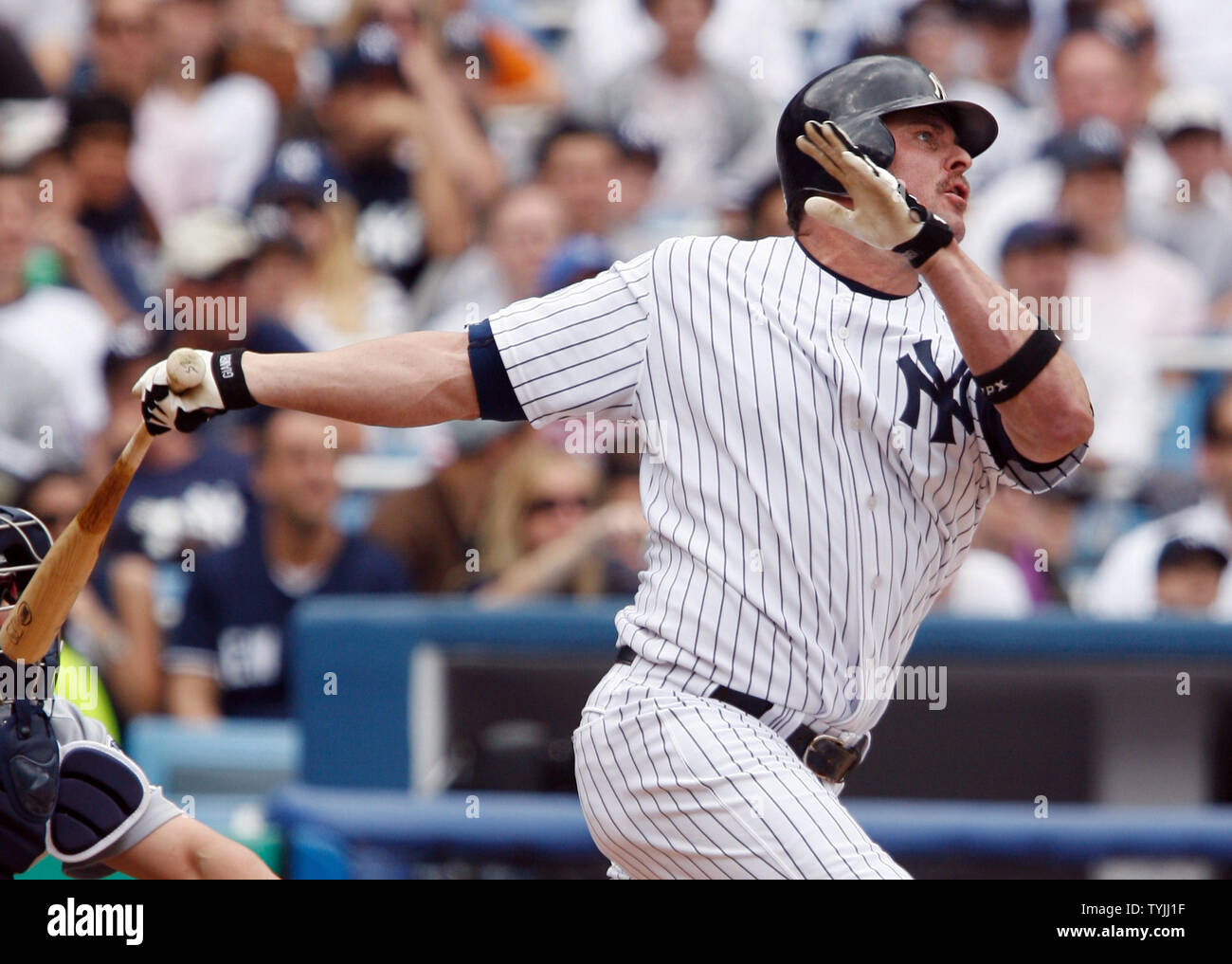 New York Yankees Jason Giambi hits a 3-run homer in the second inning ...
