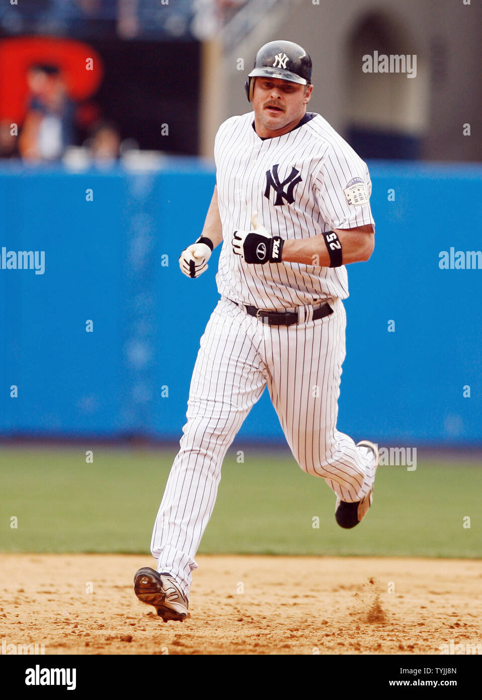 New York Yankees Jason Giambi runs the bases after hitting a walk off ...
