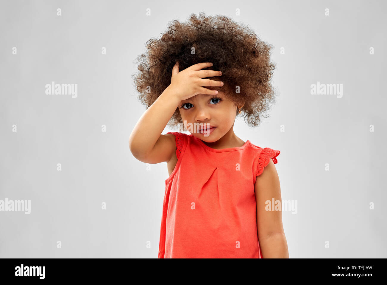 Girl touching forehead hi-res stock photography and images - Alamy