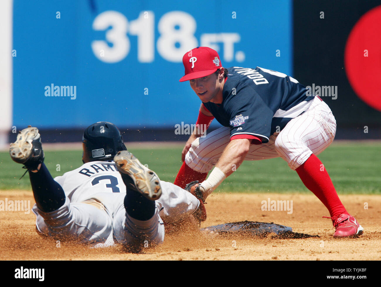 Jason Donald of the U.S. Team tags out a stealing Wilkin Ramirez of the ...