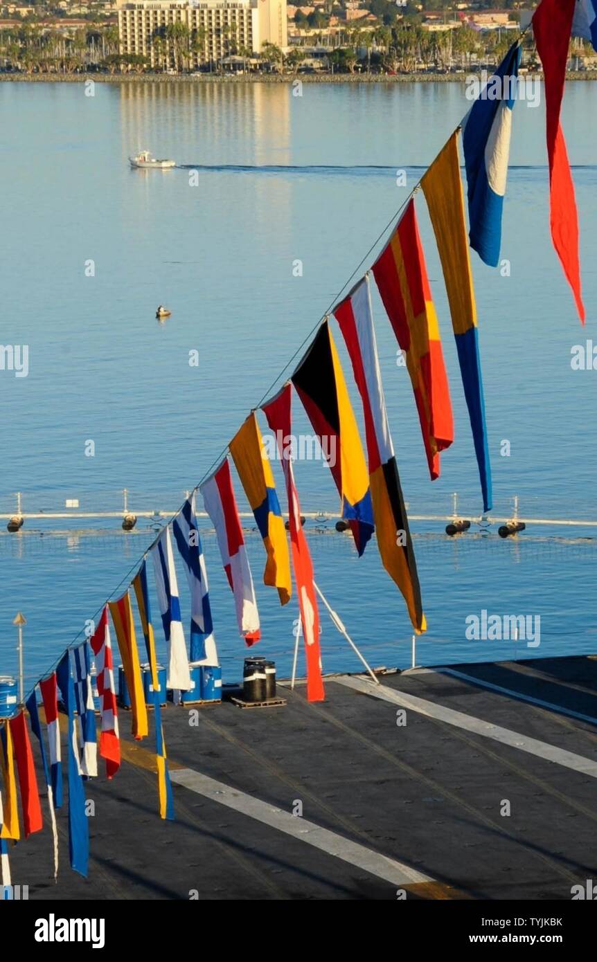 SAN DIEGO (Nov. 11, 2016) – Flags fly during the dressing of the ship ...