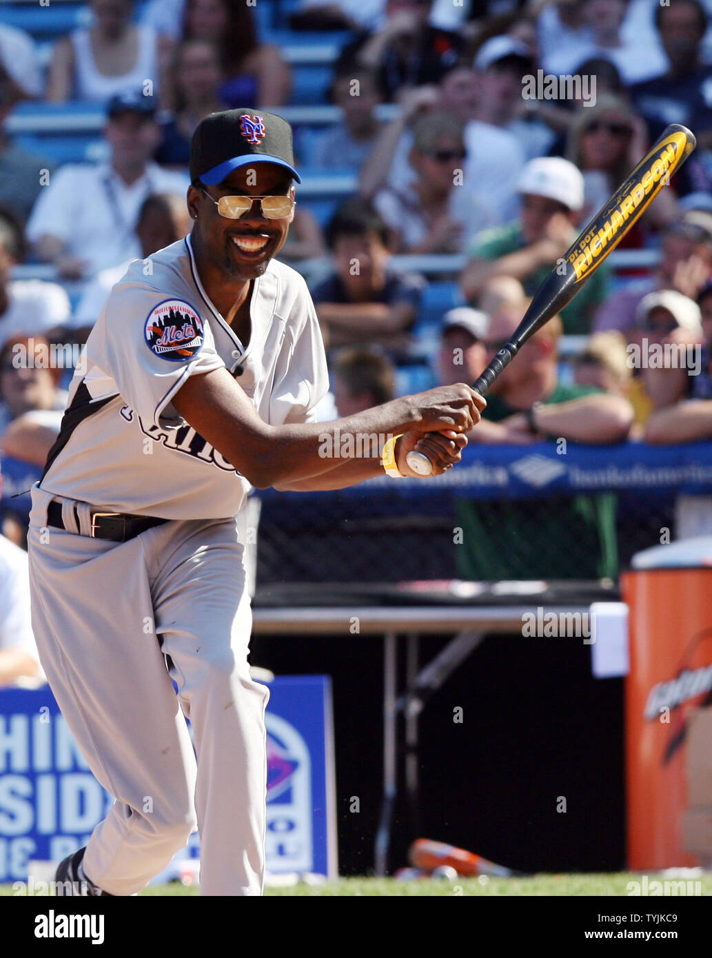 Chris Rock takes a swing at the Taco Bell All-Star Legends & Celebrity ...