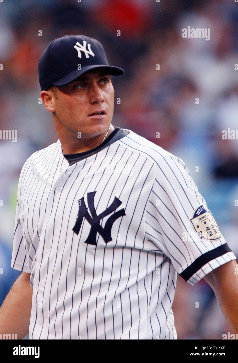 New York Yankees starting pitcher Darrell Rasner looks back while ...