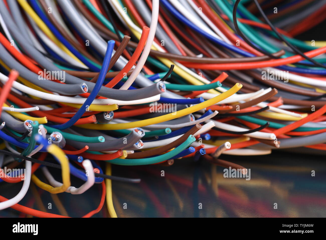 Multidolored electric cables closeup Stock Photo - Alamy