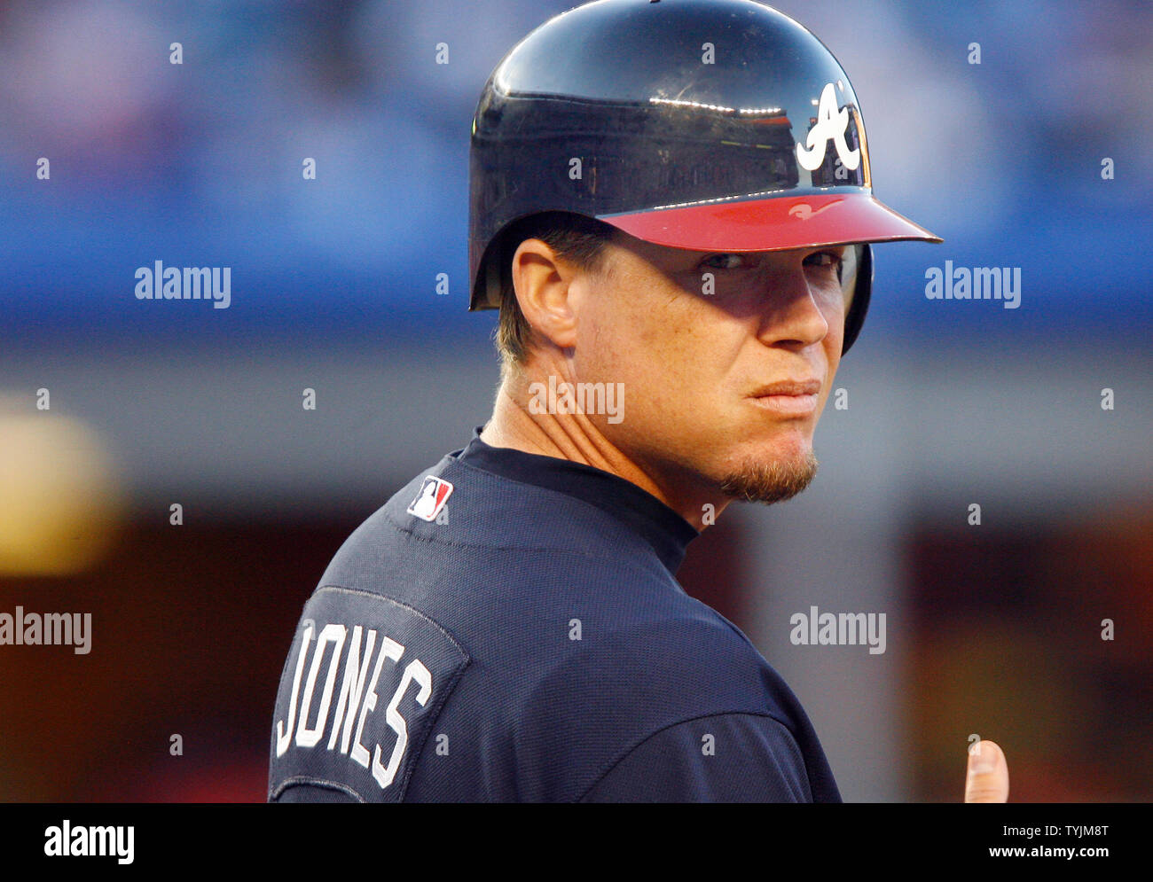 Atlanta Braves Chipper Jones stands on first base after walking in the ...