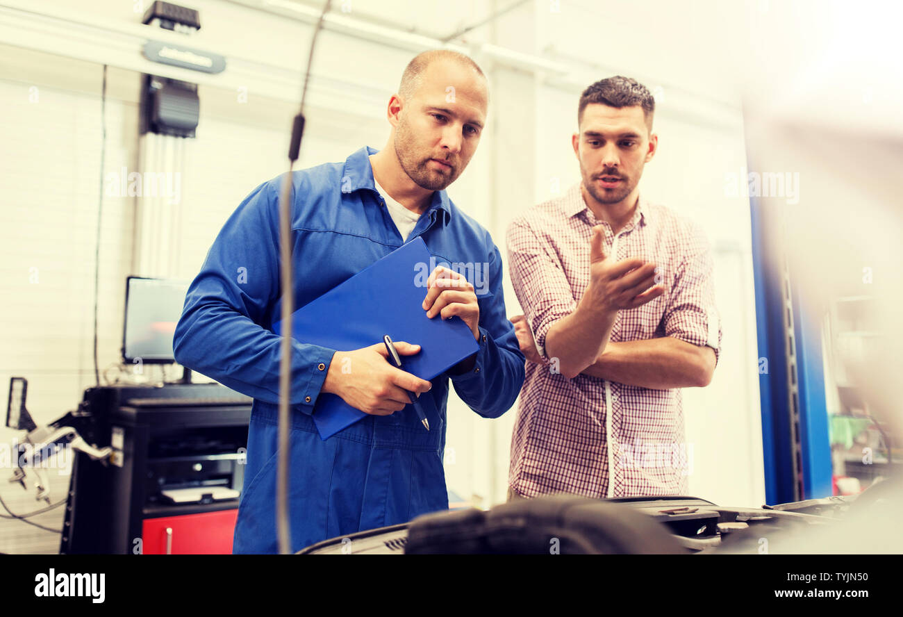 Mechanic clipboard talking man owner hi-res stock photography and ...