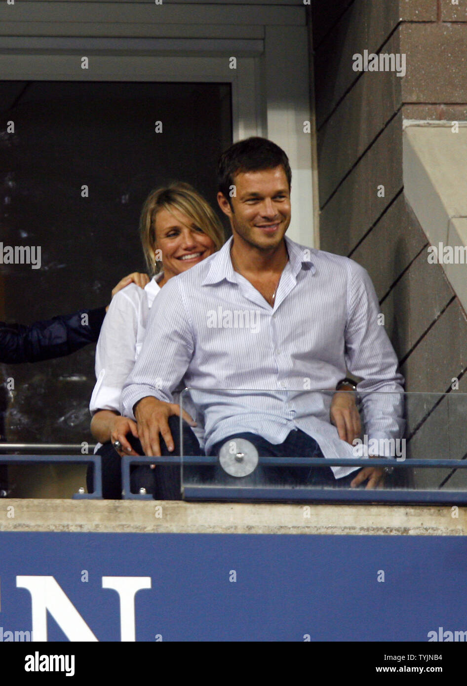 Cameron Diaz and a guest watch Andy Roddick play Fernando Gonzalez on ...