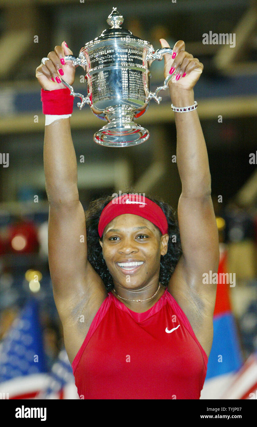 Serena Williams of the U.S.A, fourth seed, shows off her trophy after ...