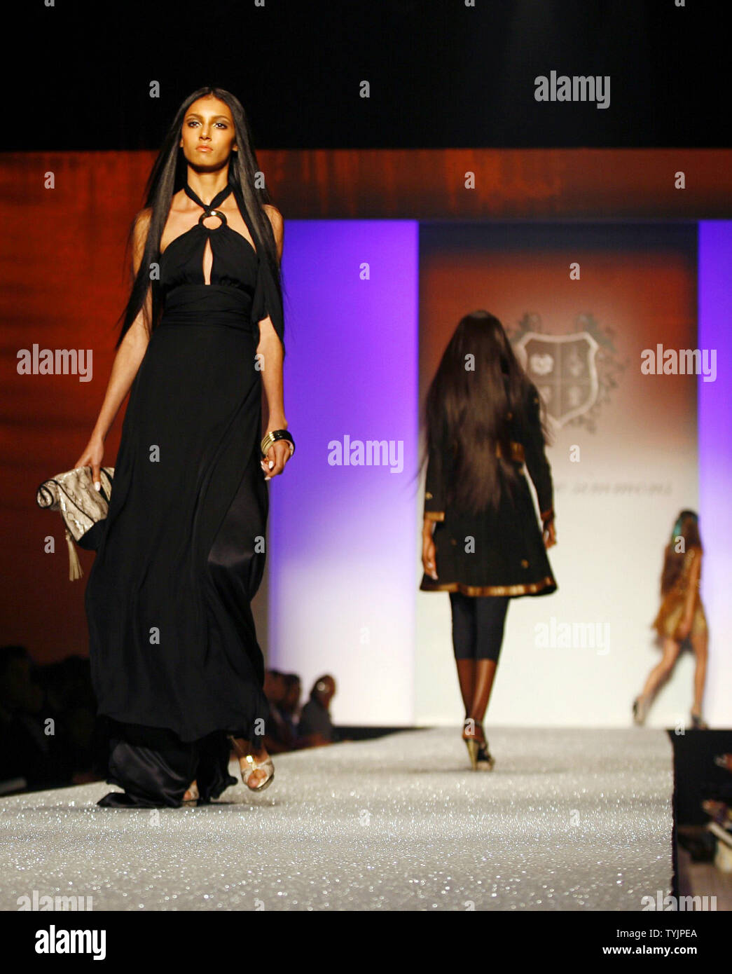 Models walk the runway at the Baby Phat Decade fashion show at the ...