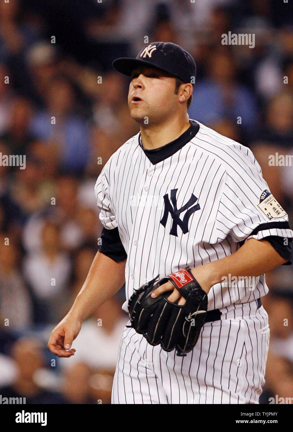 New York Yankees relief pitcher Joba Chamberlain reacts after the third ...
