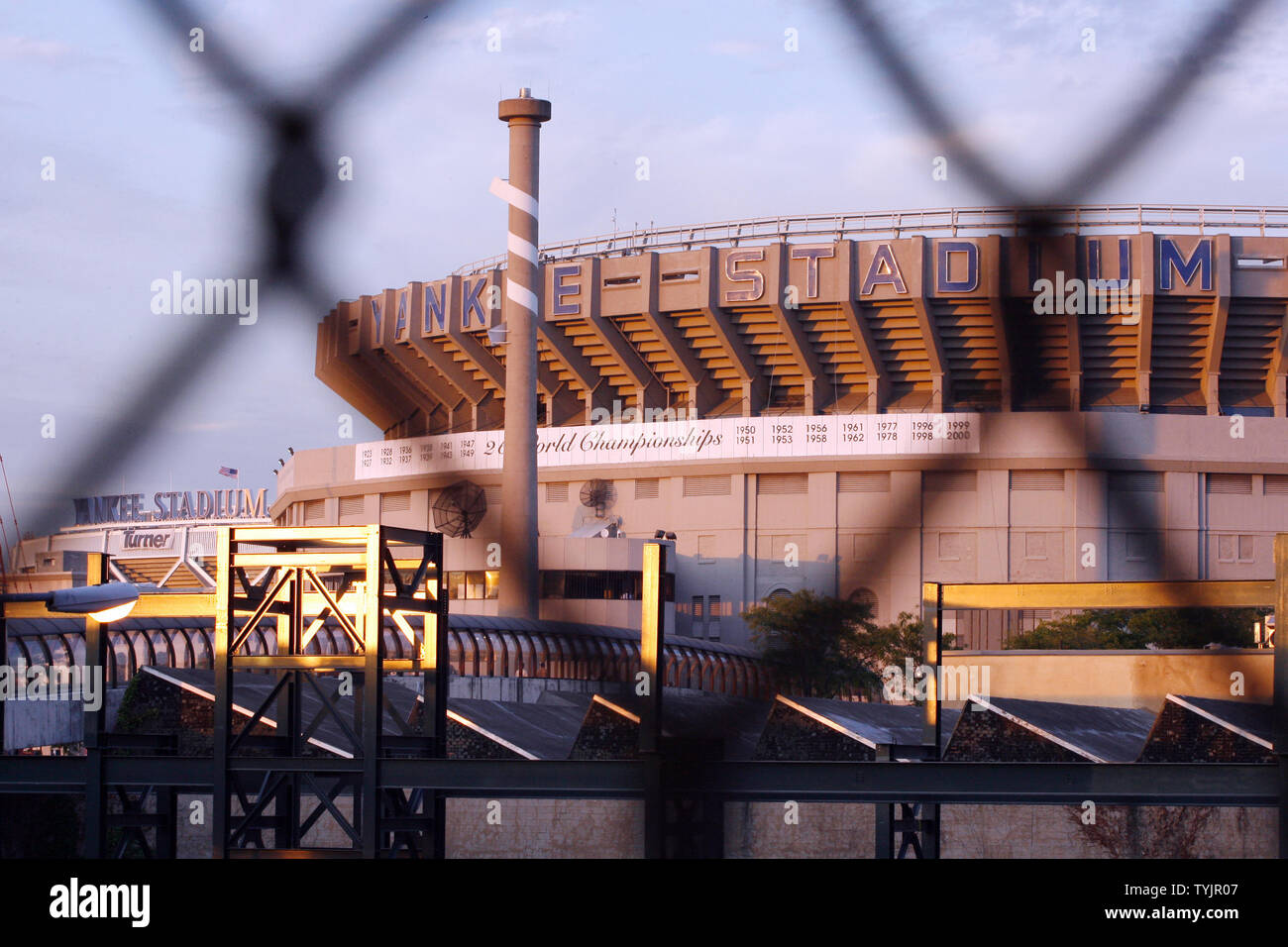 The new Yankee Stadium and the old Yankee Stadium stand side by side ...
