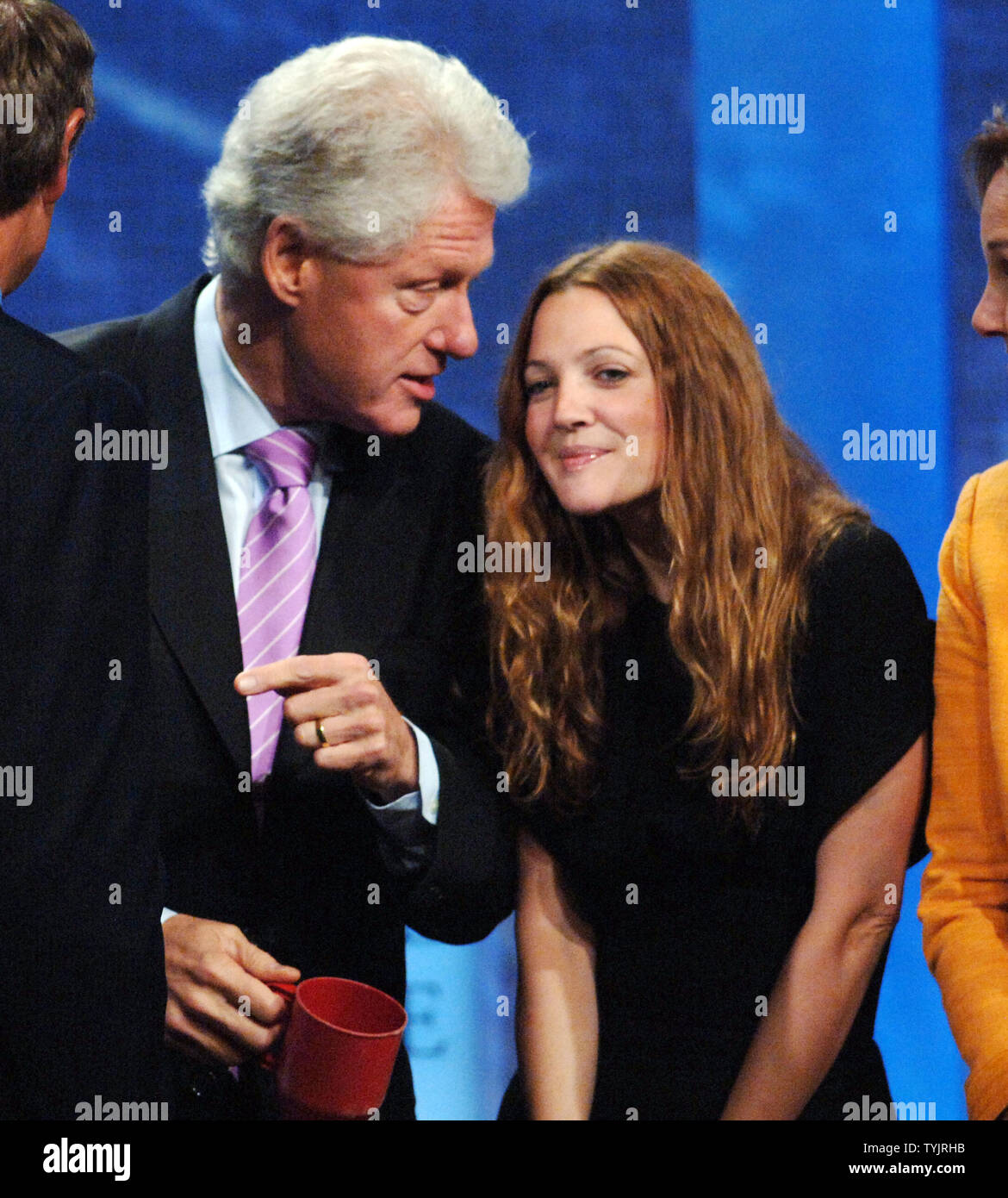 Actress Drew Barrymore chats with former President Bill Clinton at the ...
