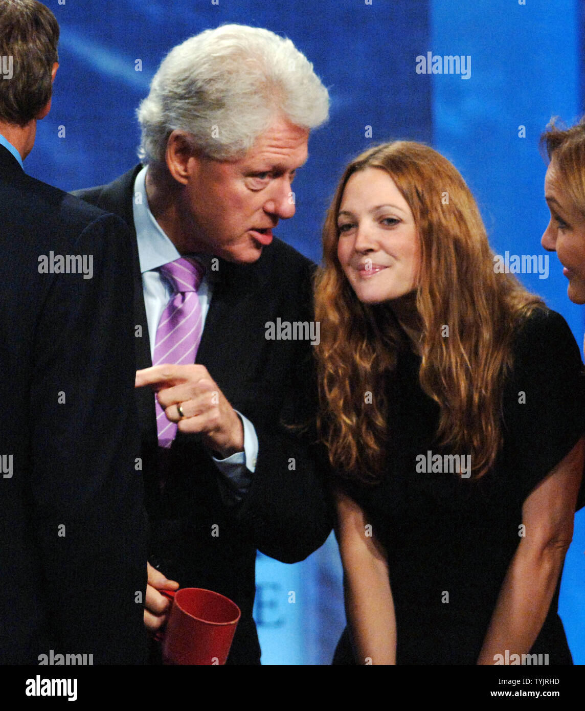 Actress Drew Barrymore chats with former President Bill Clinton at the ...