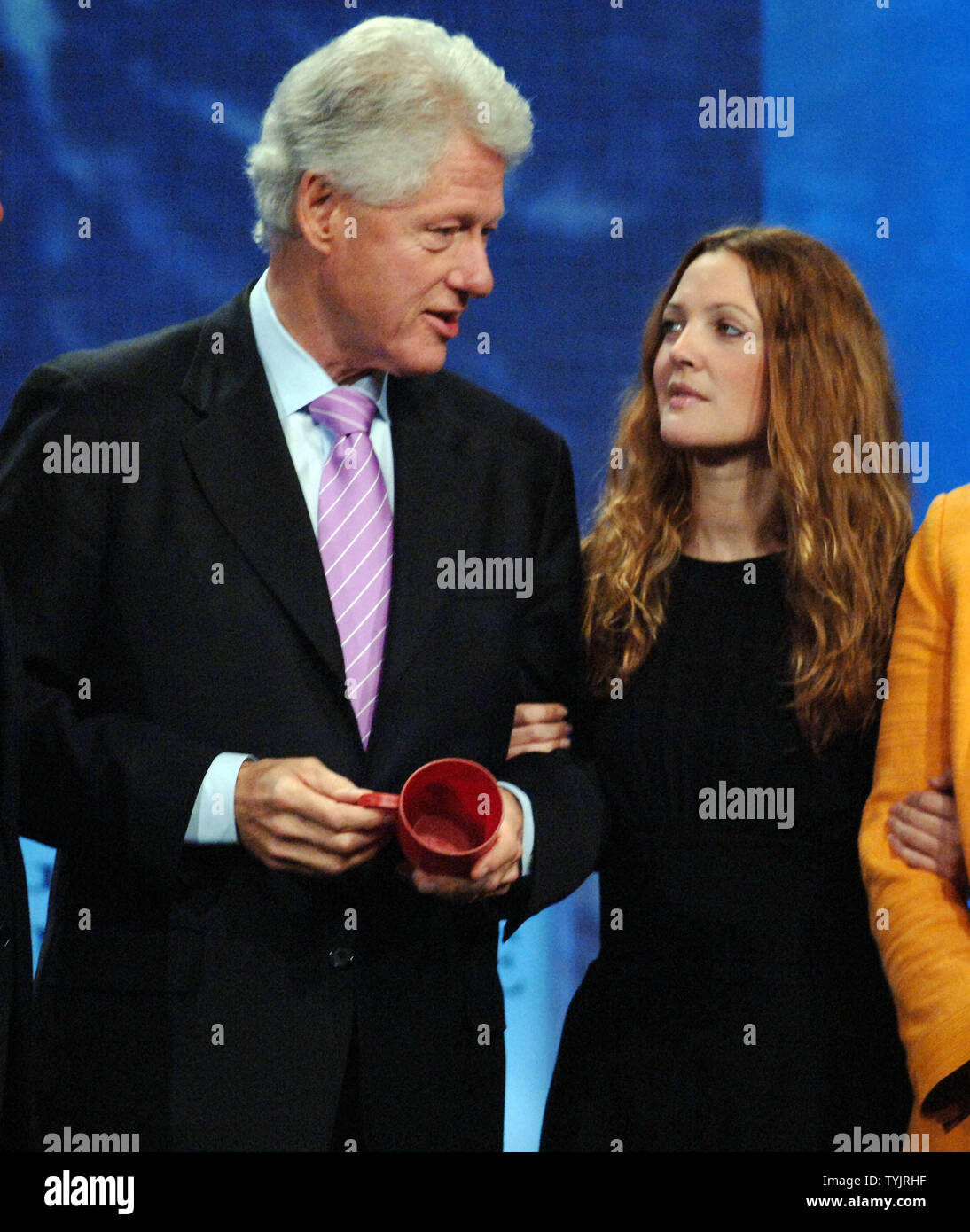 Actress Drew Barrymore chats with former President Bill Clinton at the ...