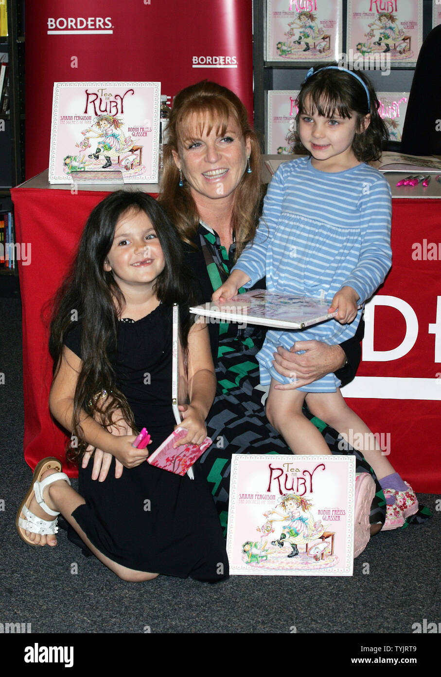 Sarah Ferguson, the Duchess of York, poses with young fans before ...