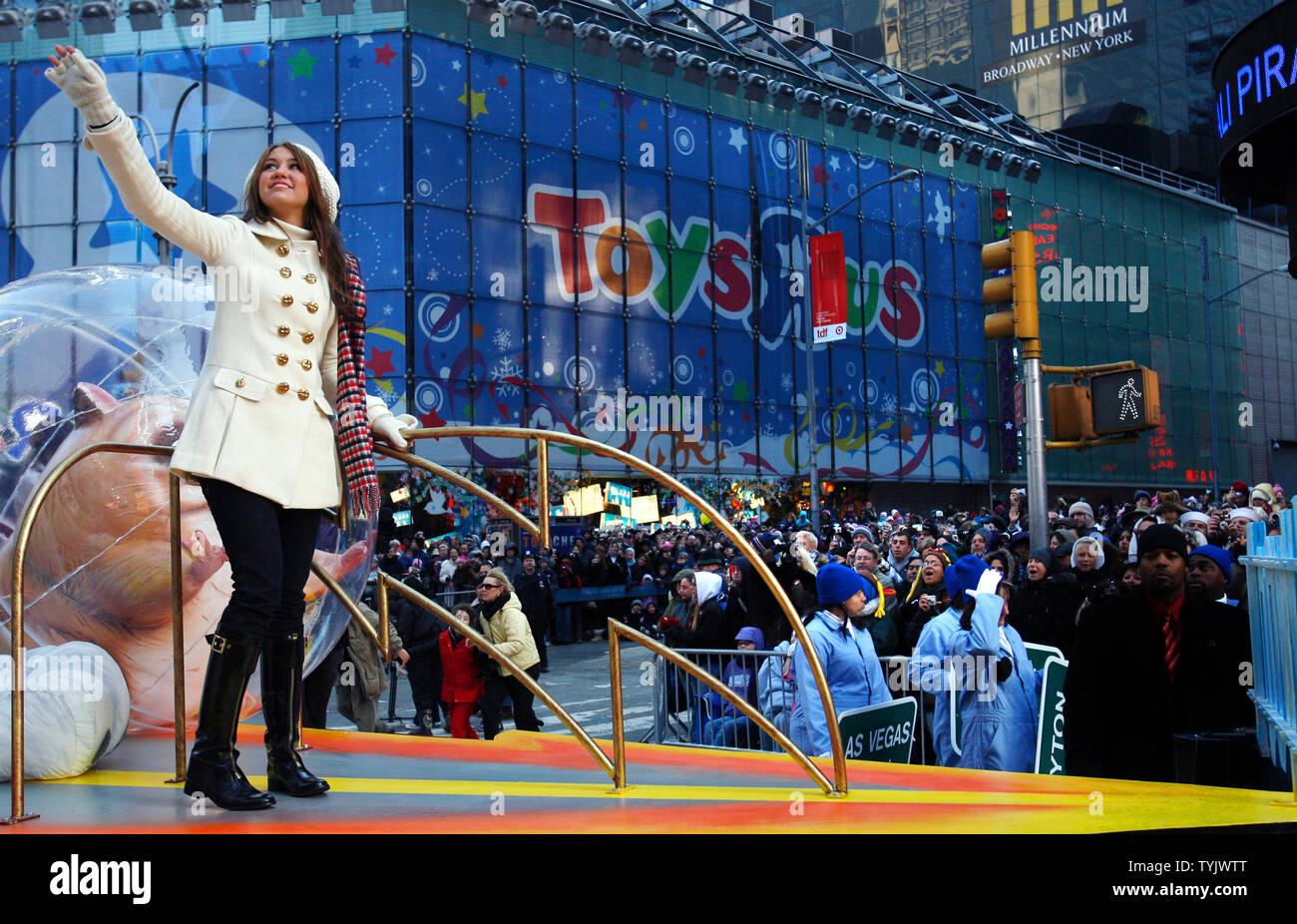 Miley Cyrus rides down the parade route on a float at the Macy's 82nd ...