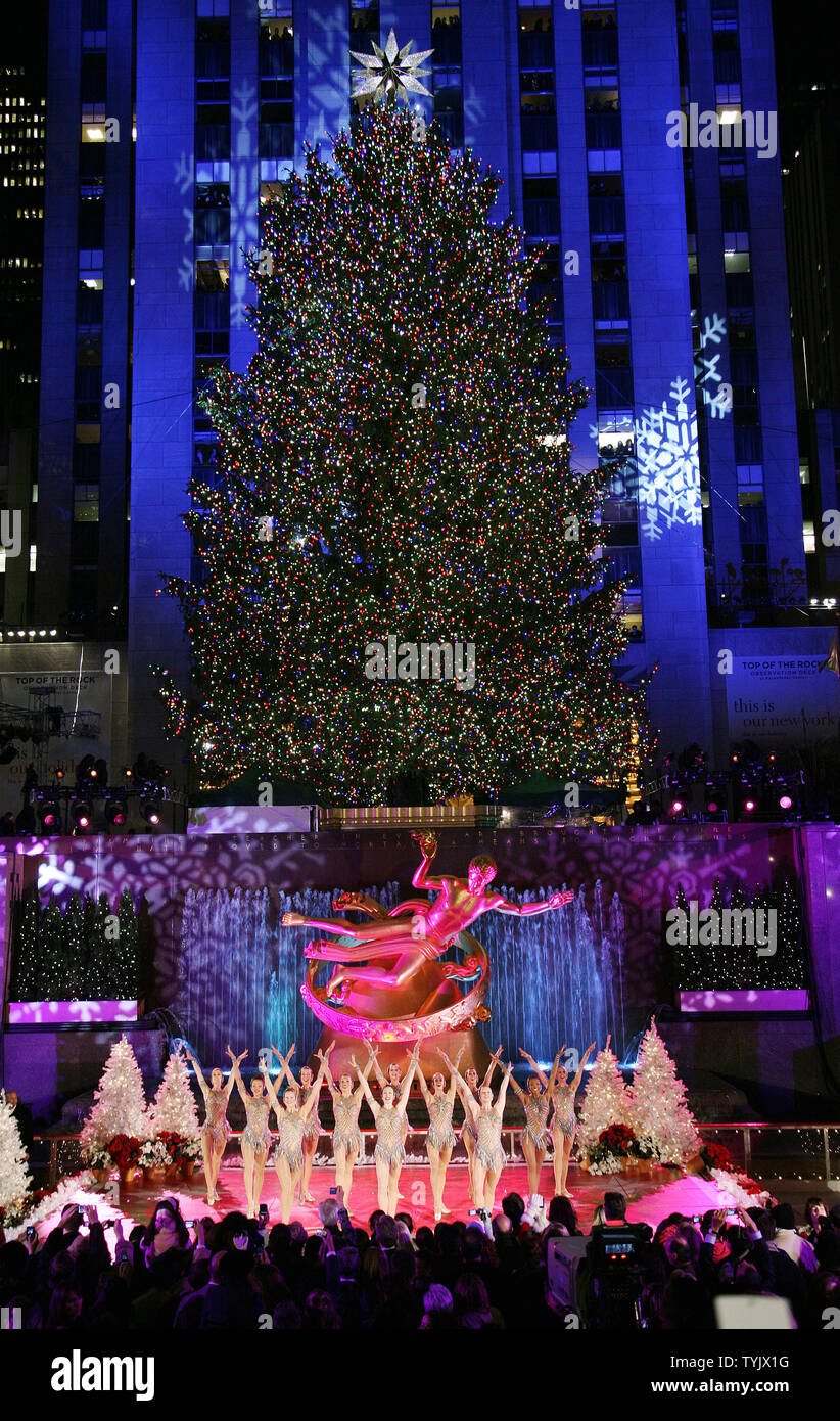 The Rockettes perform as the Rockefeller Center Christmas tree is lit ...