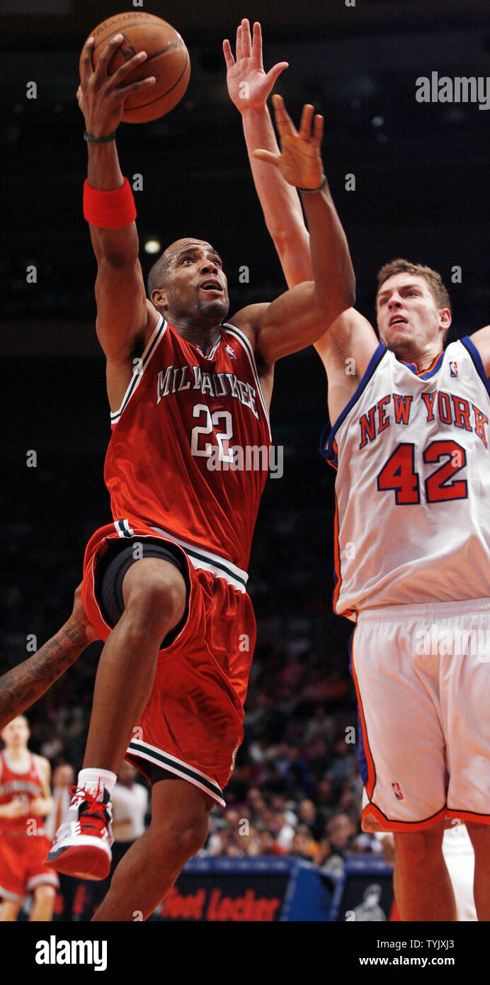 Milwaukee Bucks Michael Redd (22) shoots a lay up while New York Knicks ...