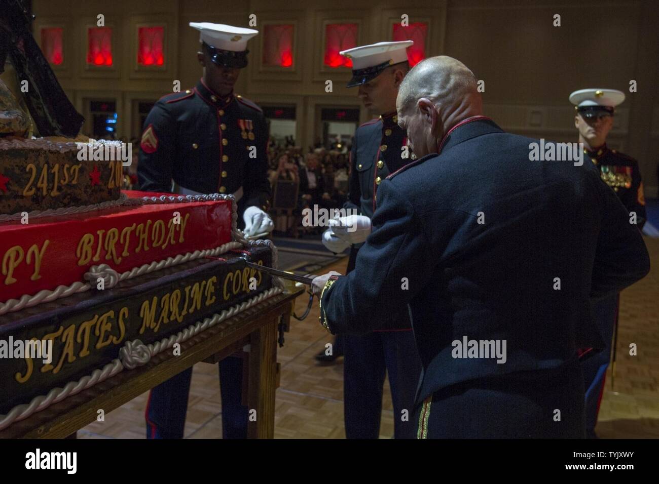 Commandant of the Marine Corps (CMC) Gen. Robert B. Neller cuts a cake ...