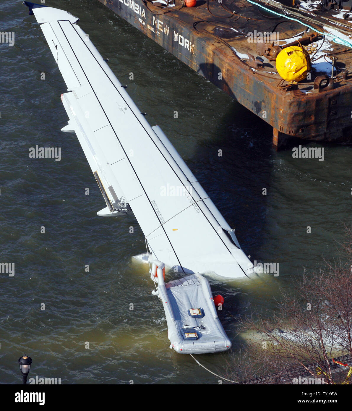 The left wing of US Airways A320 Airbus Jet Flight 1549 flown by Capt ...
