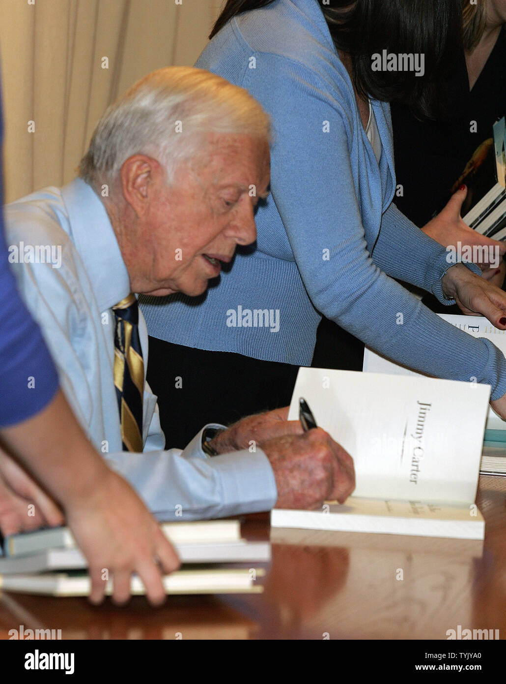 Former U.S. President Jimmy Carter introduces his new book "We Can Have ...