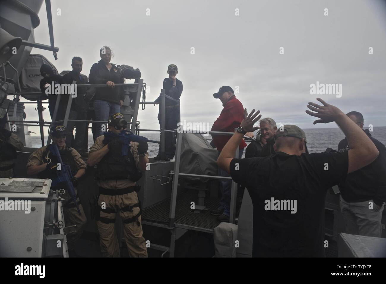 PACIFIC OCEAN (Nov. 12, 2016) Tiger cruise participants observe a visit ...