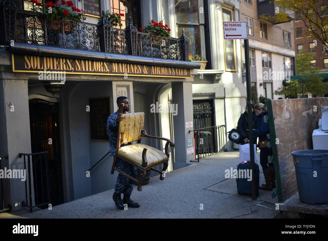 NEW YORK (Nov. 12, 2016) Seaman Dashiva Francois helps to clean out the ...