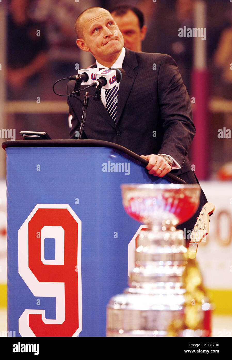 Adam Graves reacts while at the podium before his New York Rangers ...