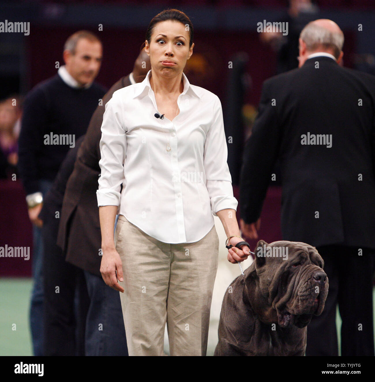Ann Curry of the NBC Today Show reacts after being dragged around as a ...