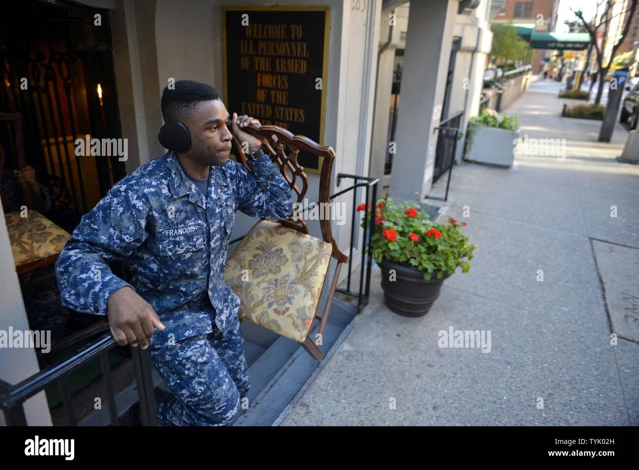 NEW YORK (Nov. 12, 2016) – Seaman Dashiva Francois helps to clean out ...