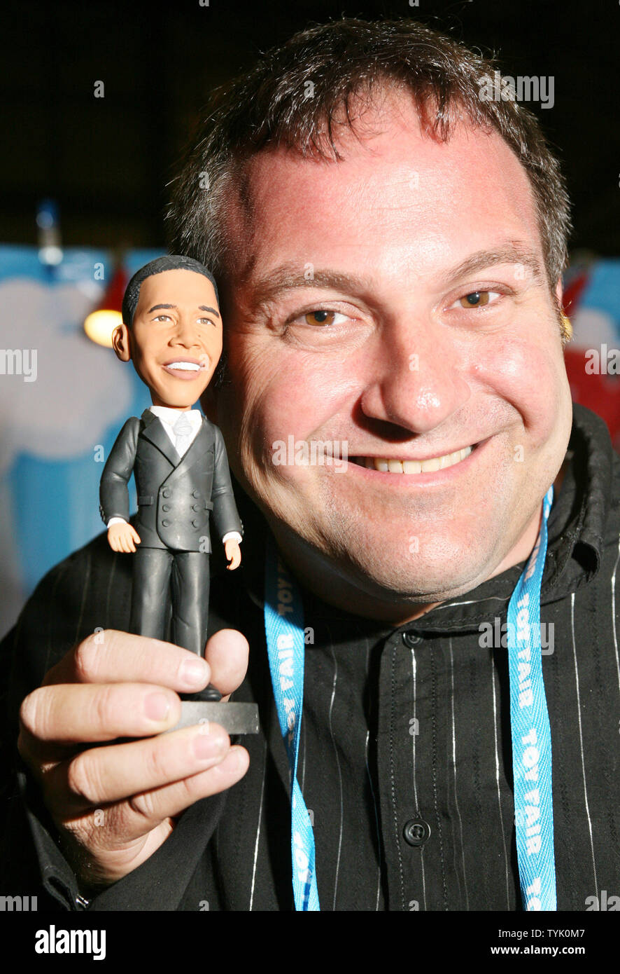Graeme Warring, president of Modelworks, poses with his "Obaman" action ...