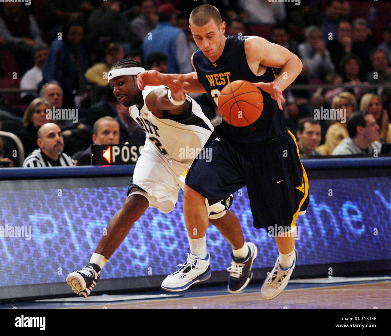 Pittsburgh Panthers Levance Fields (2) reaches in for the ball held by ...