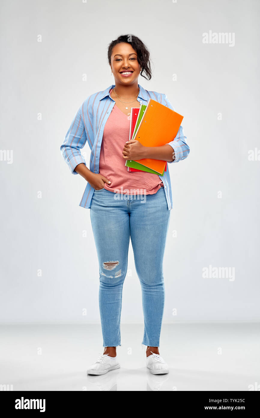 african american student woman with notebooks Stock Photo - Alamy
