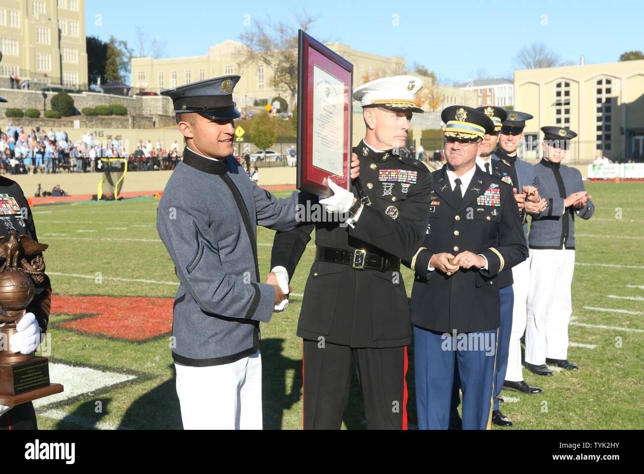 Cadet Richard C. Dow and Brig. General Stephen M. Neary display the ...