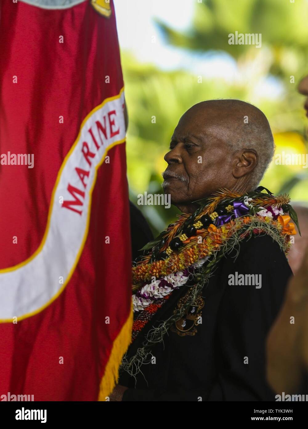 Dr. Ernest James Harris, Jr. stands during a Congressional Gold Medal ...