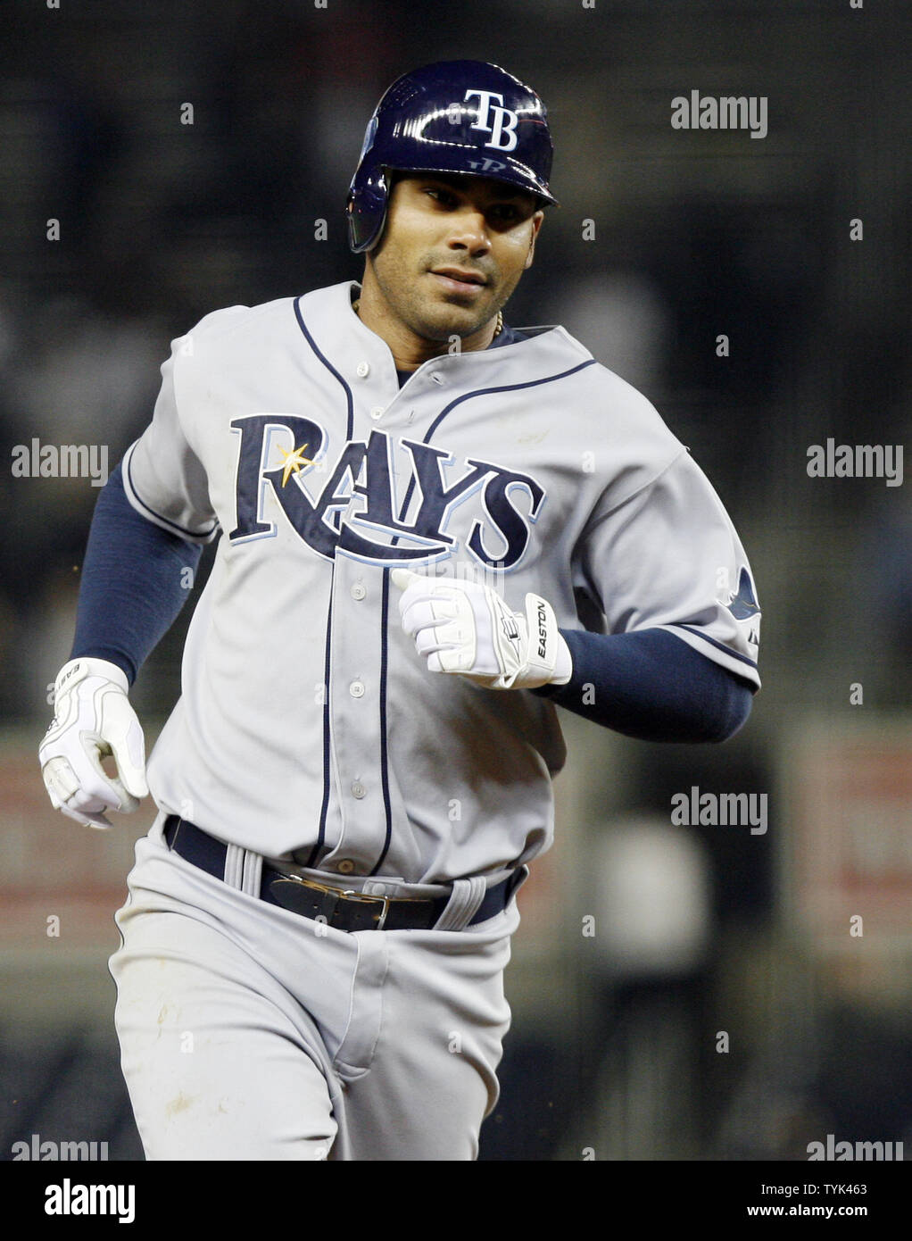 Tampa Bay Rays Carlos Pena runs the bases after hitting a solo homer in ...
