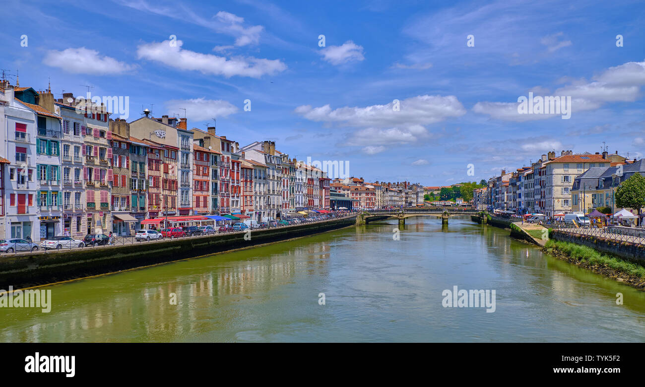 View of typical basque architecture on houses along the Nive river ...