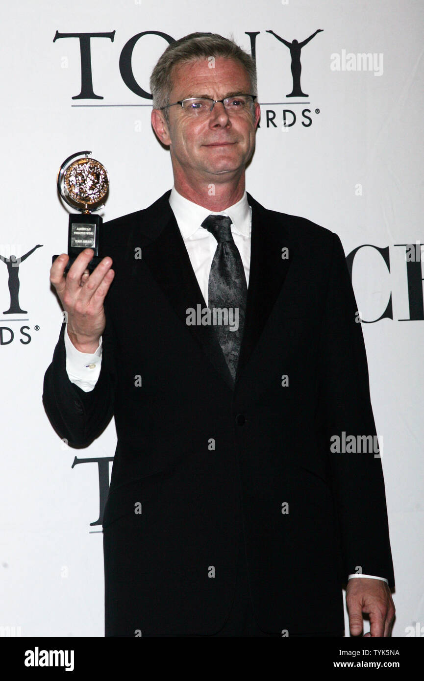 Stephen Daldry holds his award for Best Direction of a Musical for ...